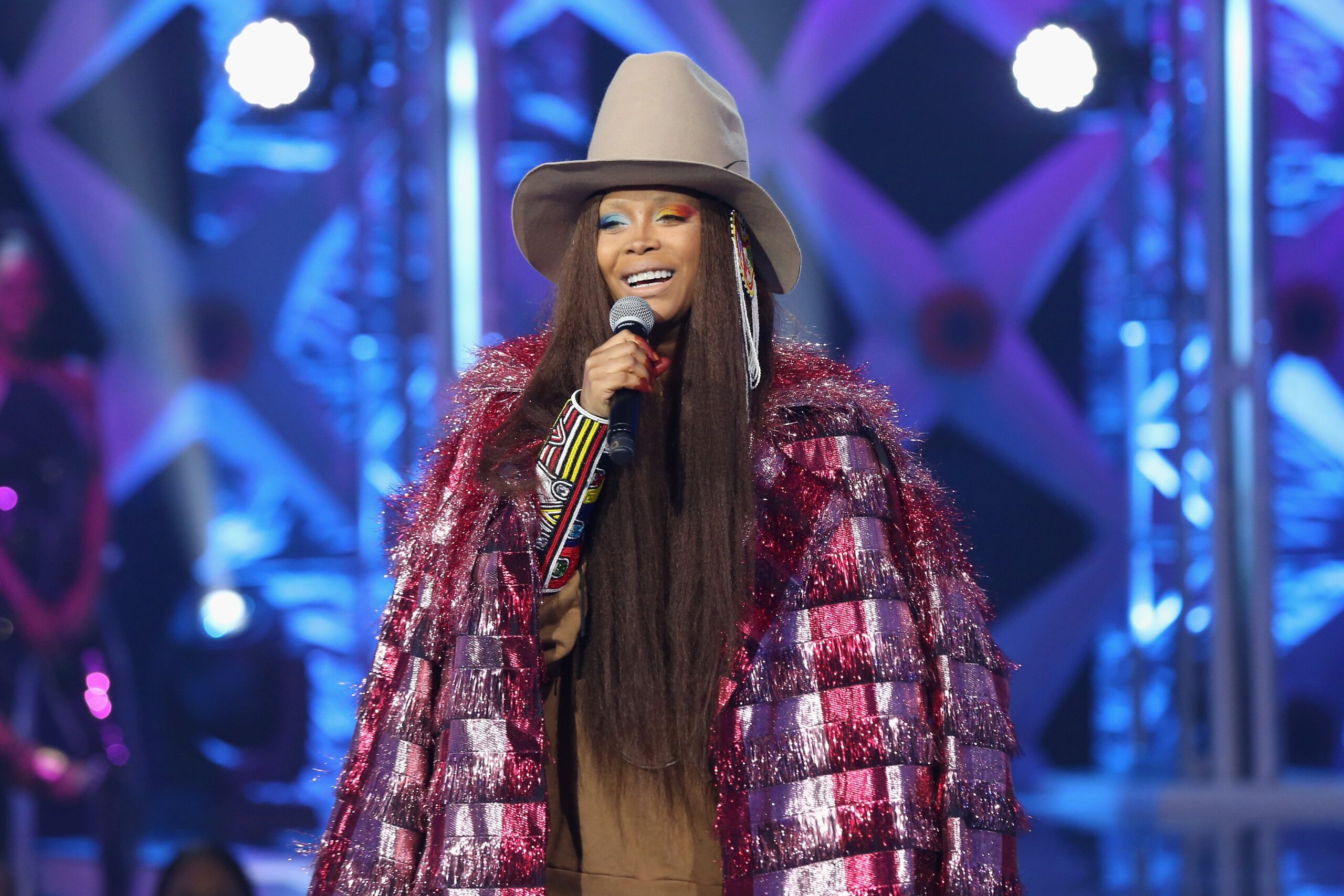 What is Erykah Badu's real name?